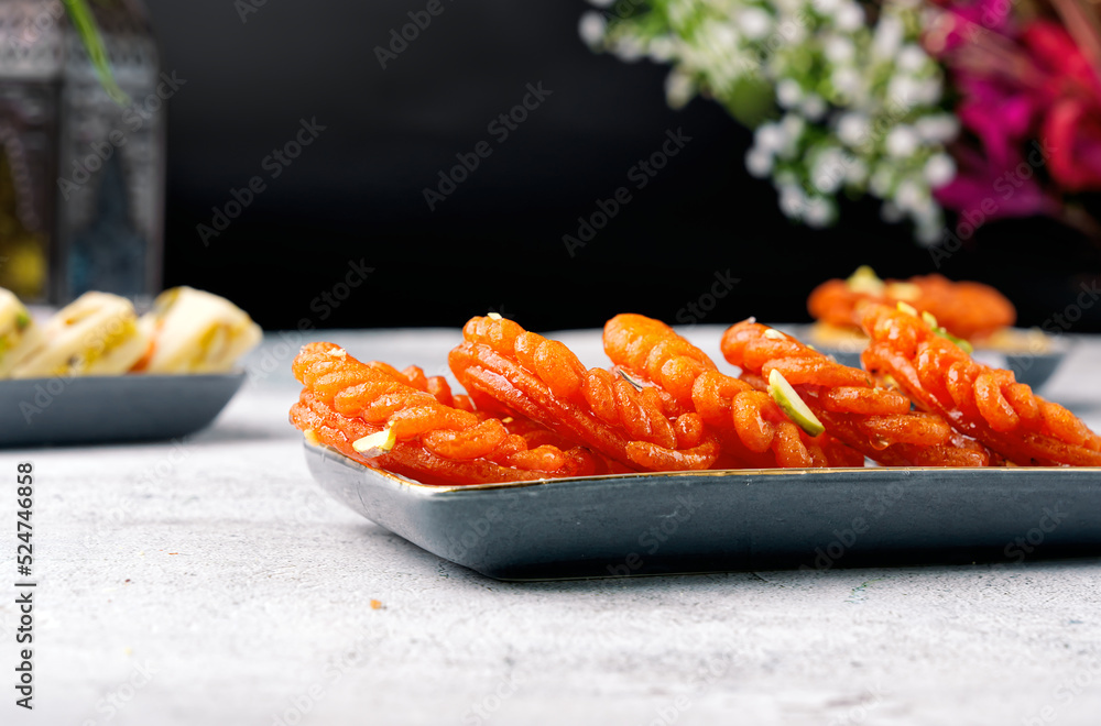 Imarti (Amriti is a sweet from India. It is made by deep-frying vigna ...