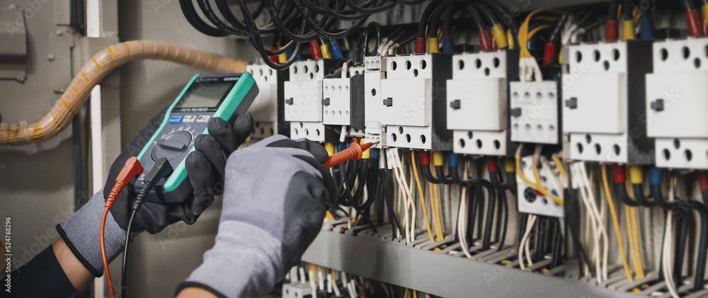 Electricity and electrical maintenance service, Engineer hand holding ...