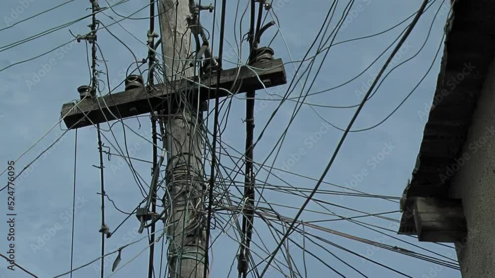 Power Lines and Communication Lines on Electric Pole in a Shanty Town ...