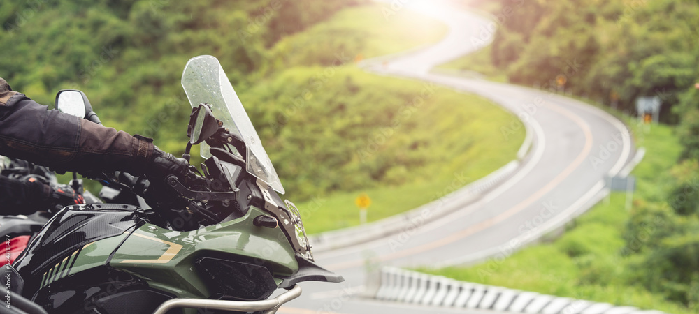 Man driving a motorcycle on a beautiful road riding Have fun riding a ...