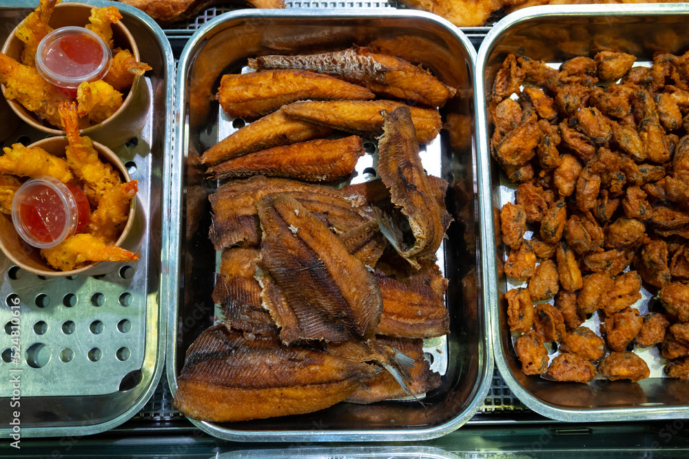 Trays containing a variety of Dutch fast food fish dishes. Shrimp in ...