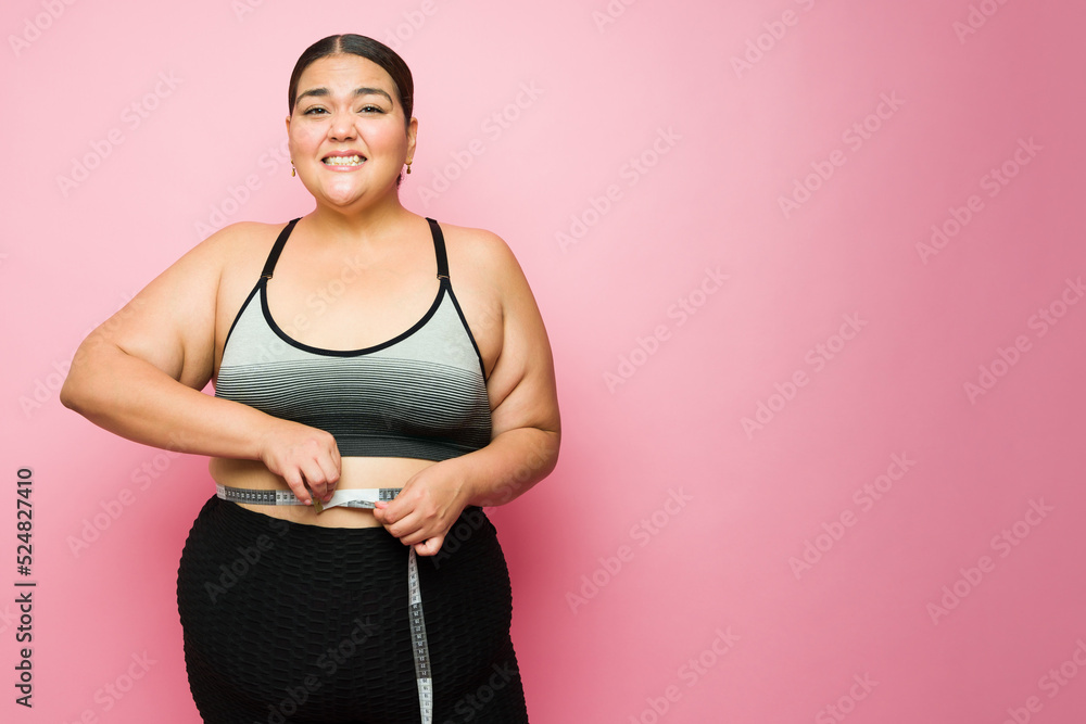 Stressed fat woman worried about her body measurements Stock Photo ...