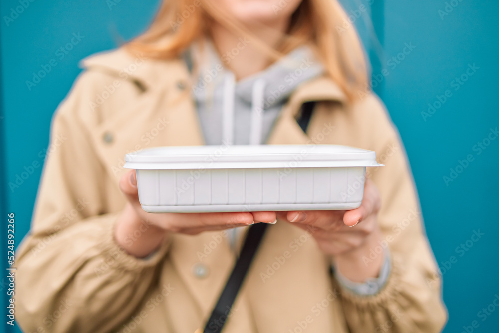 Woman hands holding empty white plastic disposable food container mock ...