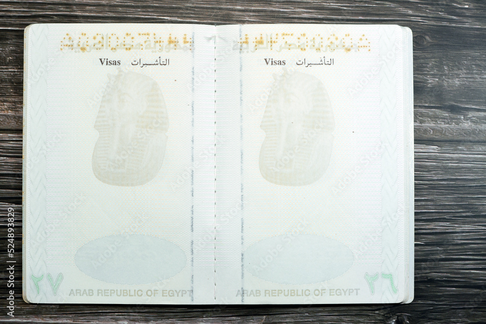 Egyptian passport isolated on wooden background, Arab republic of Egypt ...