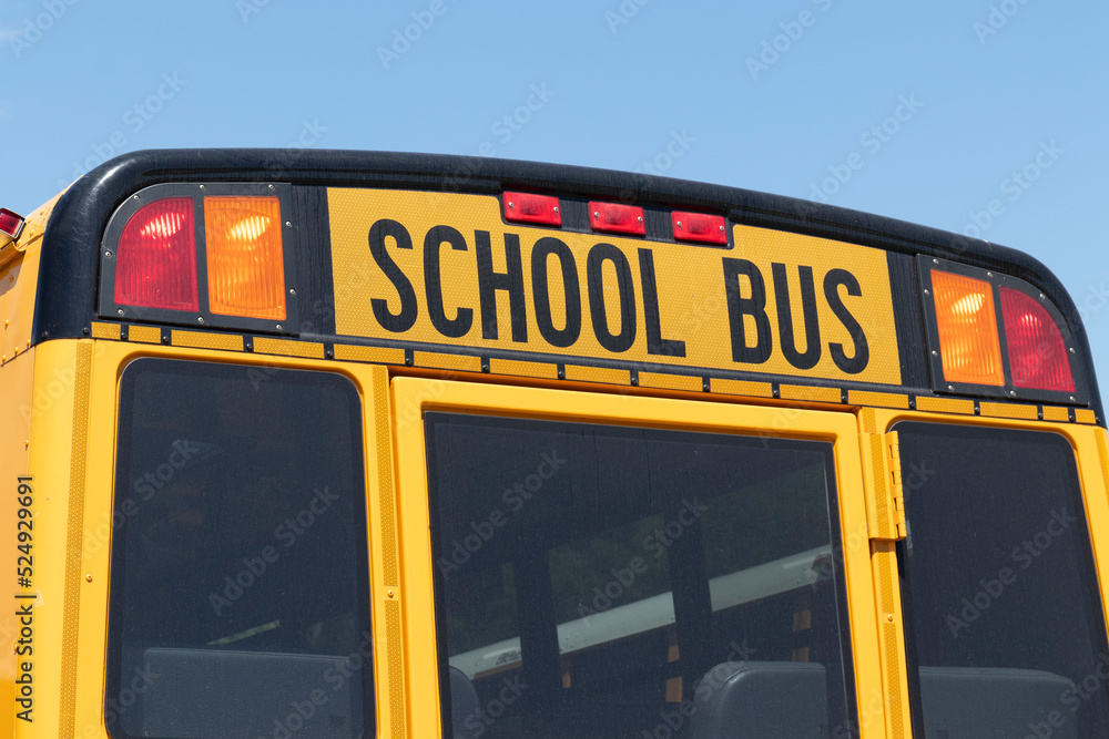 School Bus staging area waiting for students. School buses are an ...
