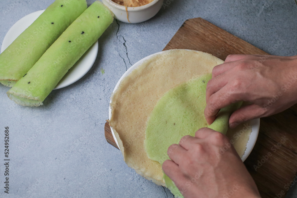 Hand roll Thai cotton candy burrito pancake or Roti Saimai, thin sheet ...