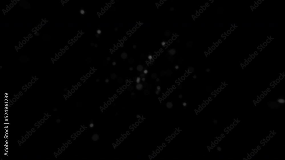 Abstract loop blurred dust particles floating on black background for ...