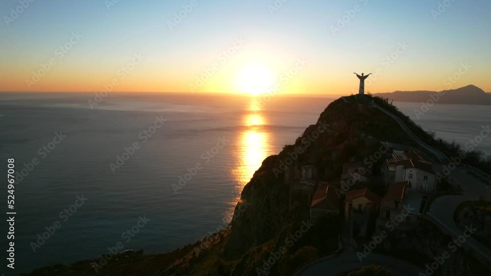 The statue of Christ the Redeemer is located in Maratea, Italy. Created ...