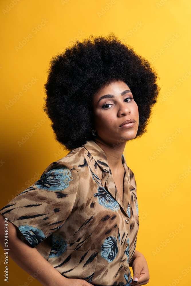 Cool Afro Girl in Studio Stock Photo | Adobe Stock