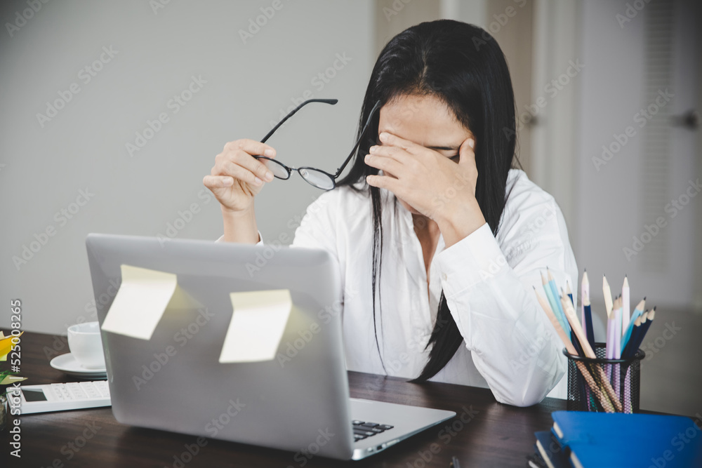 Young business woman person sleepy and has frustration eye problems ...
