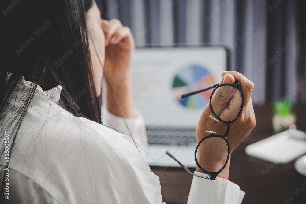 Young business woman person sleepy and has frustration eye problems ...