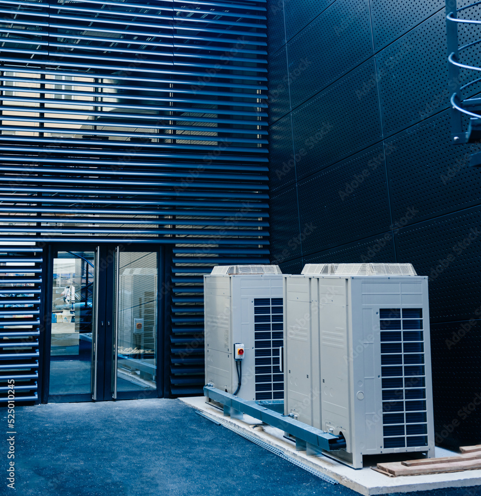 Rooftop of building with two large HVAC Heating, ventilation, and air ...