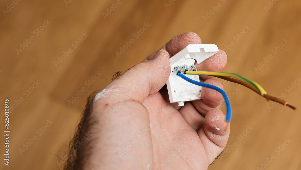 Personal perspective male hand holding during renovation reconstruction ...