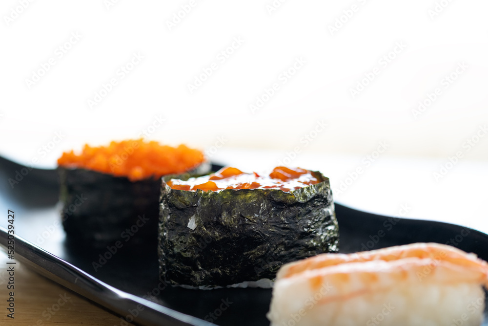 Traditional japanese nigiri sushi wrapped seaweed and various seafood ...