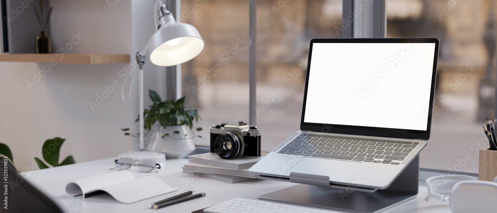 Modern office desk workspace with laptop mockup is on a laptop stand ...