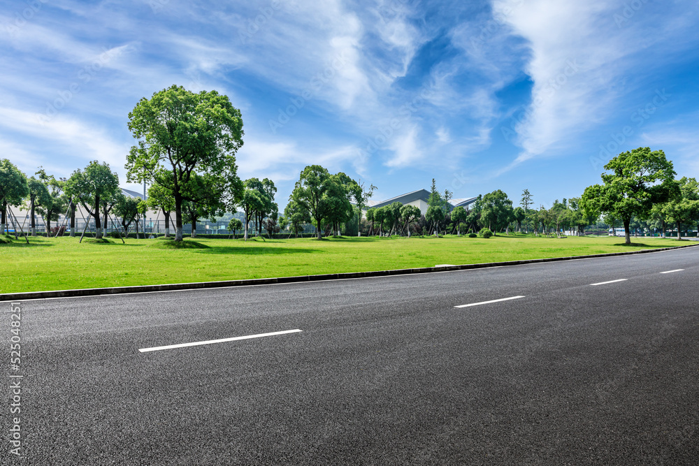 Asphalt road and green trees with grass background Stock Photo | Adobe ...