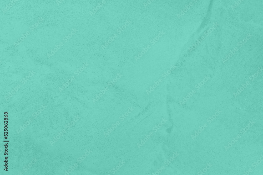 Saturated mint green colored low contrast Concrete textured background ...