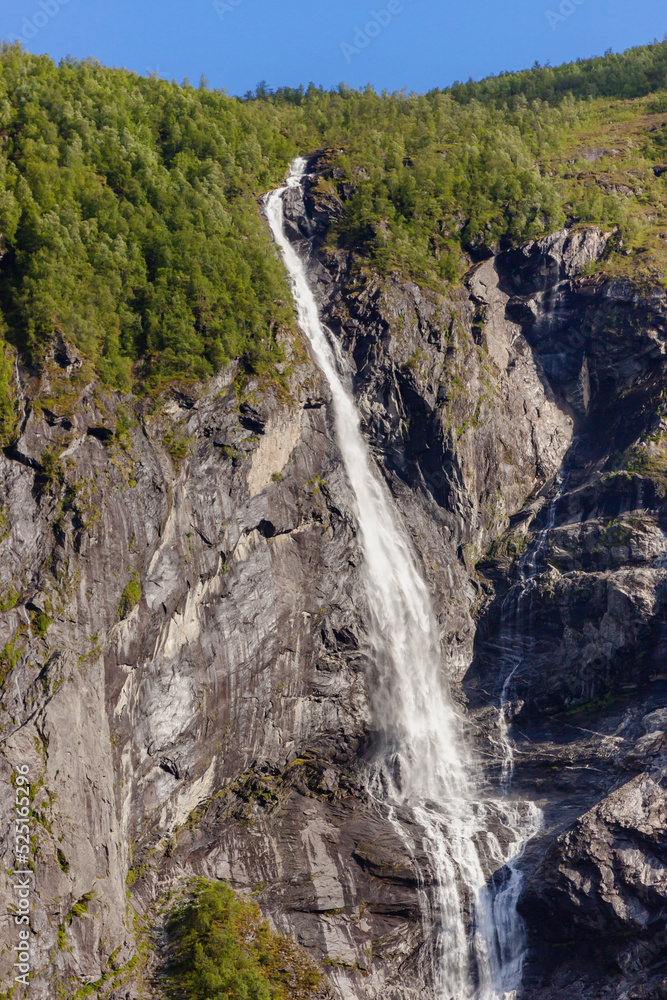 Beautiful and imposing Norwegian fjord in spring with its waterfalls ...