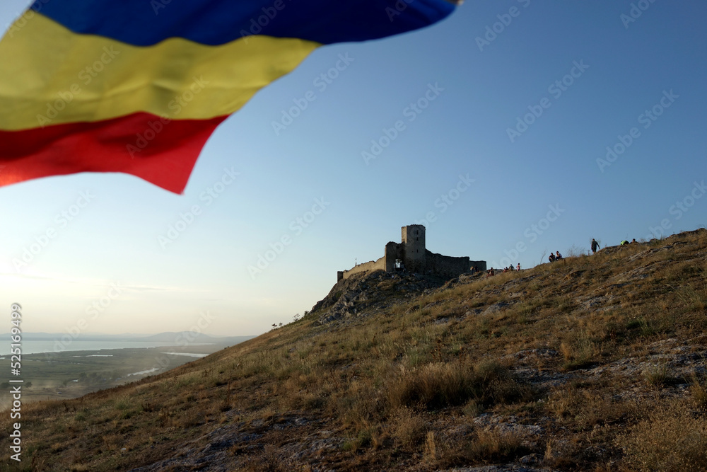 enisala stronghold and romanian flag in the wind Stock Photo | Adobe Stock