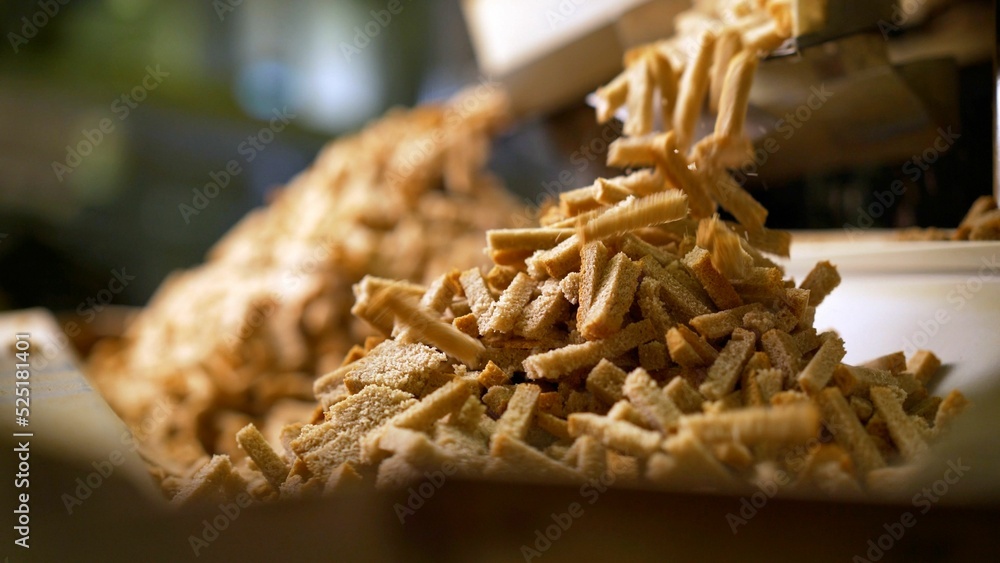 Bread crackers in production. The process of making crackers. Cracker ...