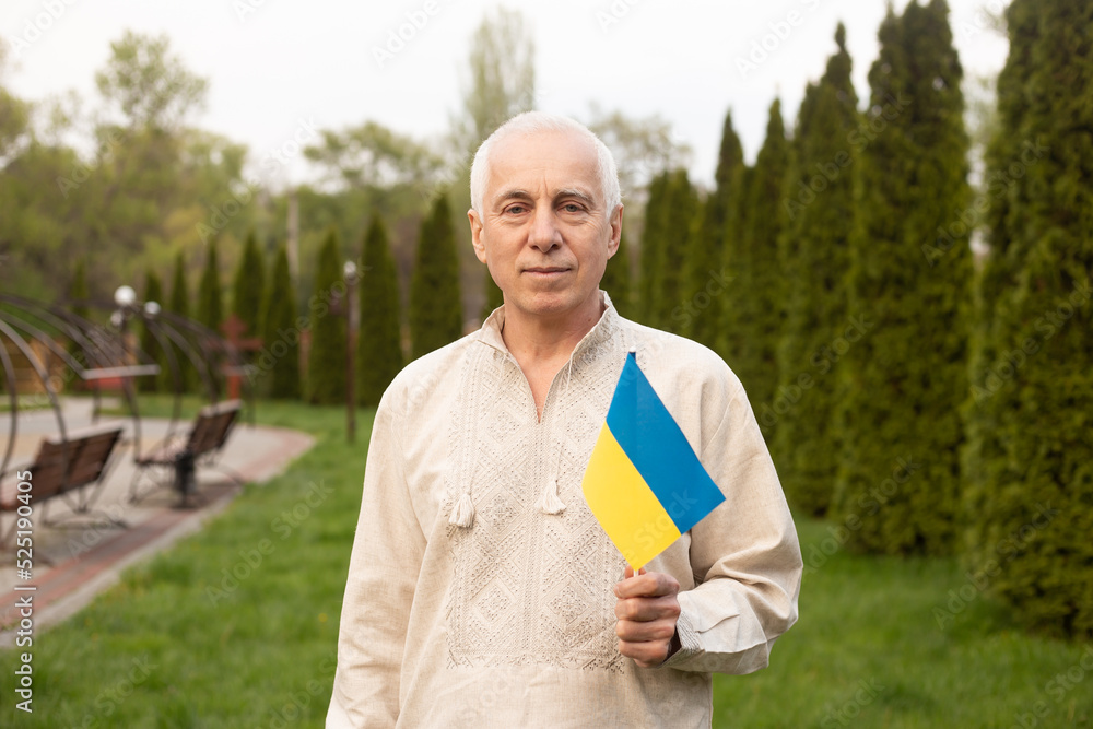 Ukrainian man. Young smiling man holding ukrainian flag. No war ...