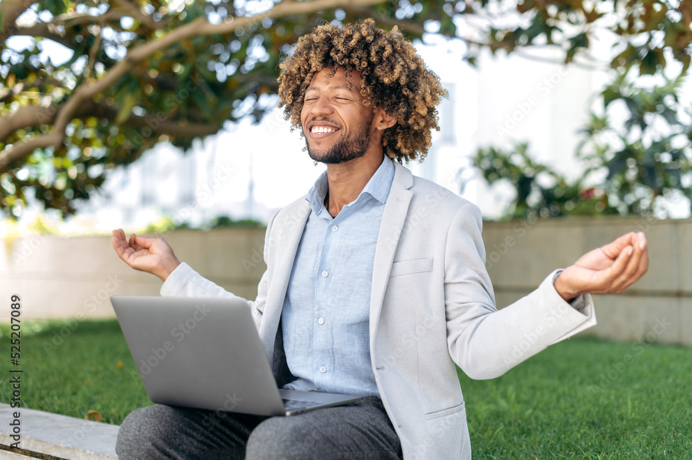 Positive calm curly haired brazilian or hispanic man, company employee ...