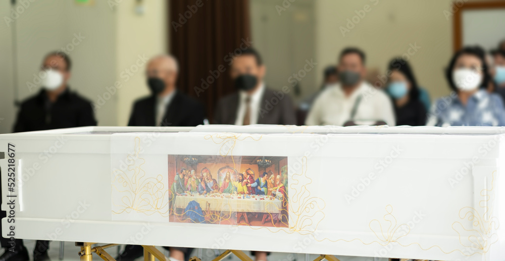 Funeral ceremony during Covid-19 pandemic. Grieving people with mask ...