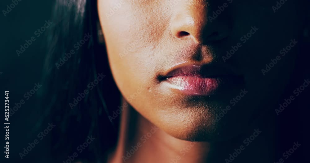 Focus and zoom of woman model mouth, lips and lower face with a serious ...