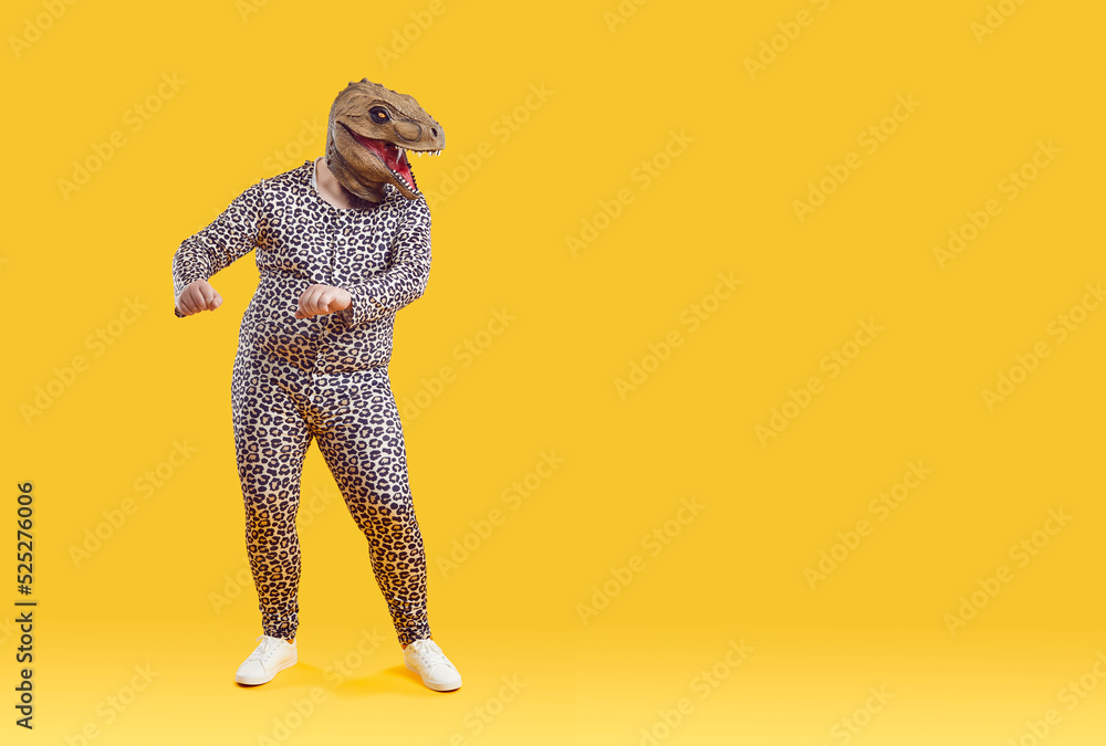 Funny Eccentric Overweight Man Dancing In Strange Dinosaur Rubber Mask