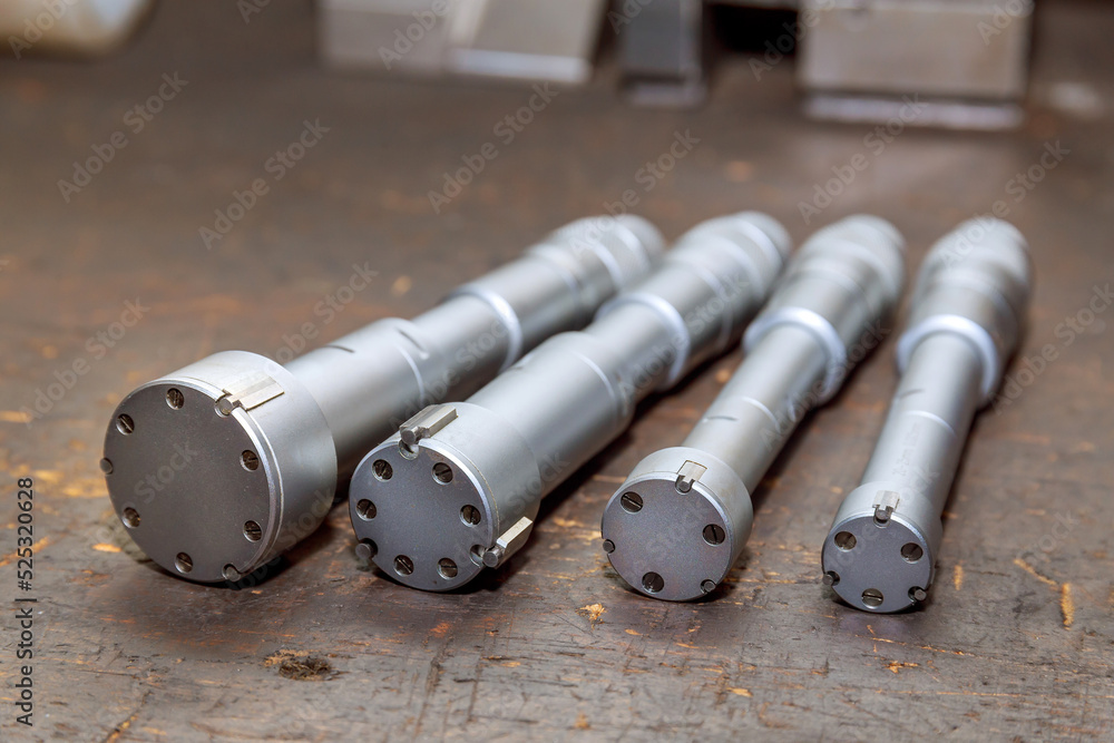 A set of micrometers for accurate measurement of different hole sizes ...