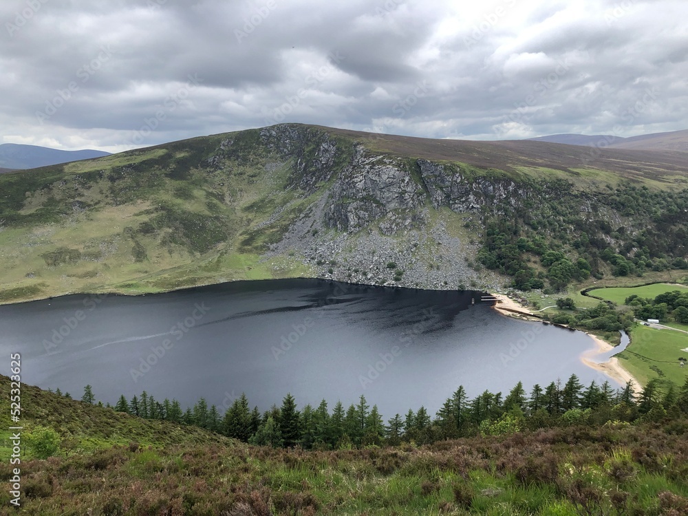 Beautiful Irish lake landscape with hills and forest. Lough Tay ...