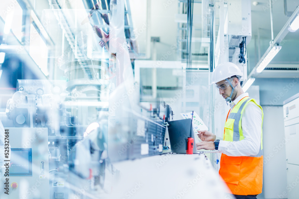 Electrician engineer tests electrical installations and wires on relay ...