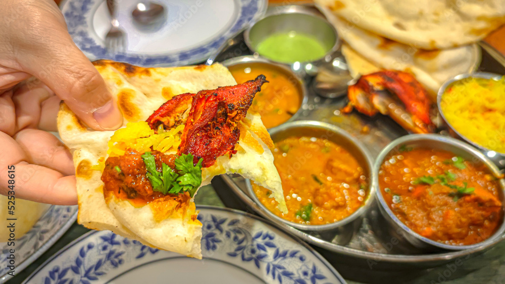 Traditional indian cuisine. Assorted indian food on table in Restaurant ...