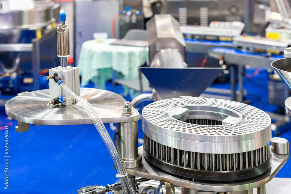 Metal stainless steel capsule disc and pin disc on rotary table ...