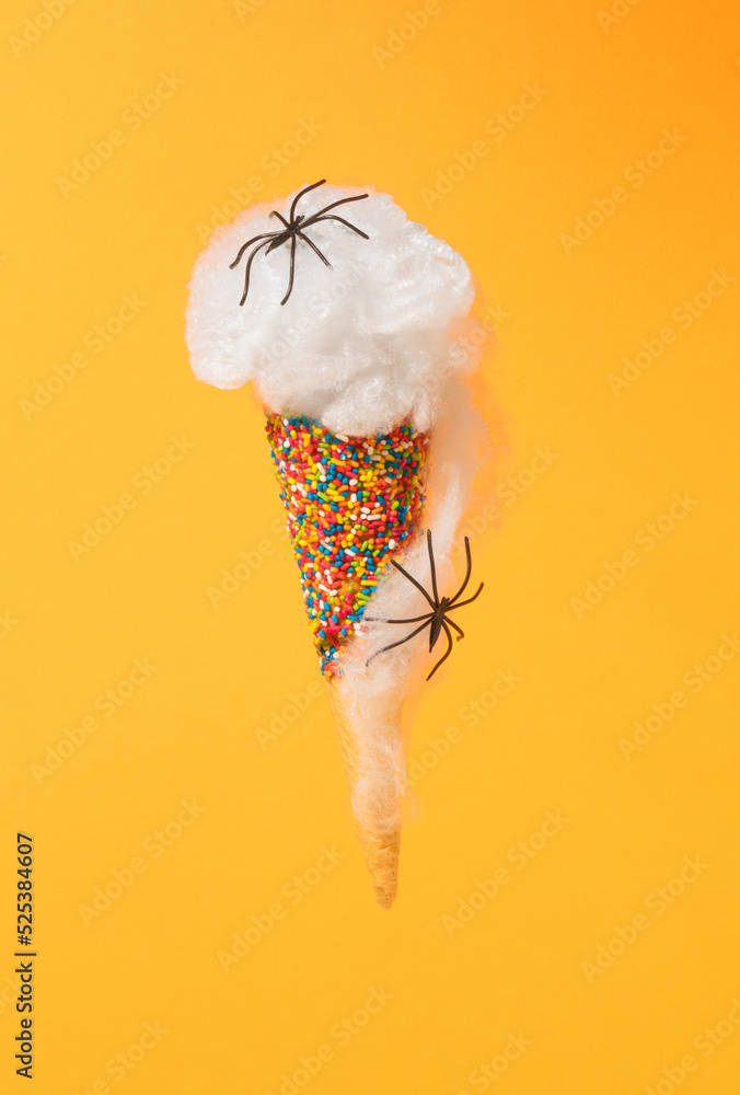 Minimal creative concept made of ice cream cone with sprinkles, spider ...