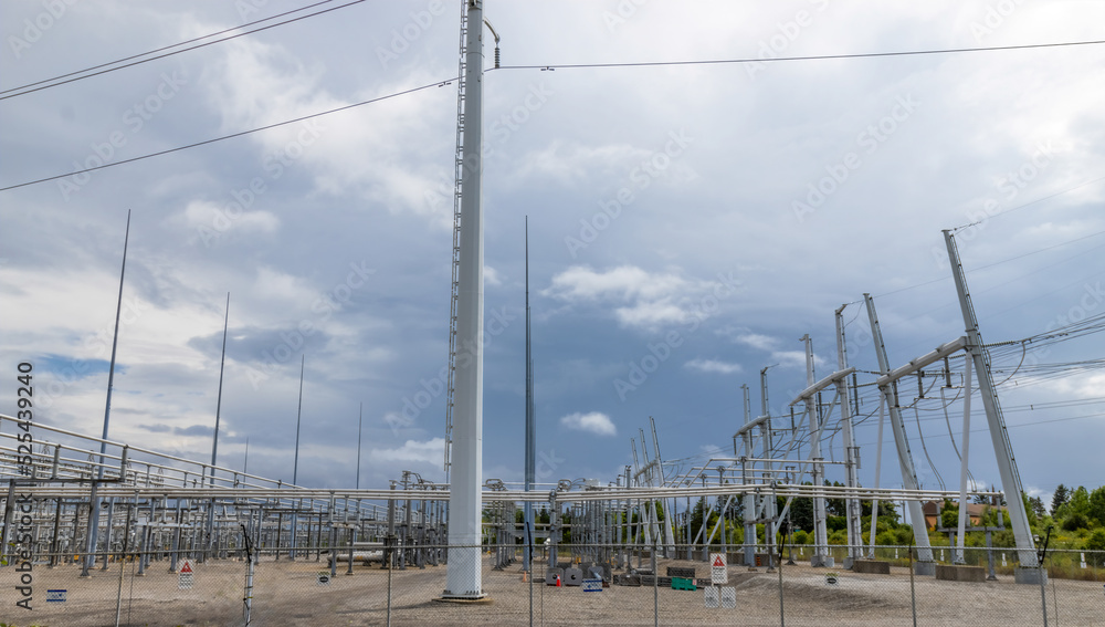 View inside of an electrical utility transformer station showing high ...