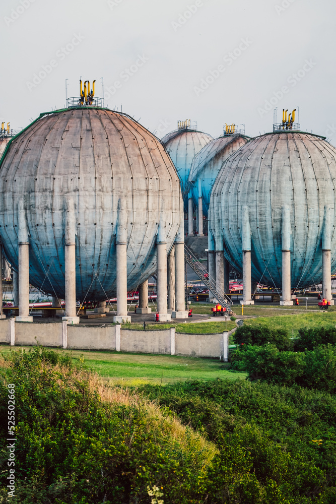 Spherical gas tanks at refinery Stock-Foto | Adobe Stock