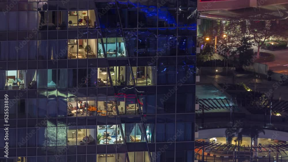 Windows lights in modern office and residential buildings timelapse at ...