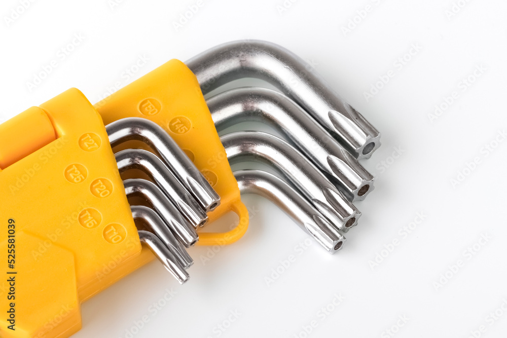 Set of Torx keys. Silver Torx wrench set. White background. incoming ...