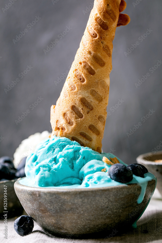 Turquoise ice cream in waffle cones Stock Photo | Adobe Stock
