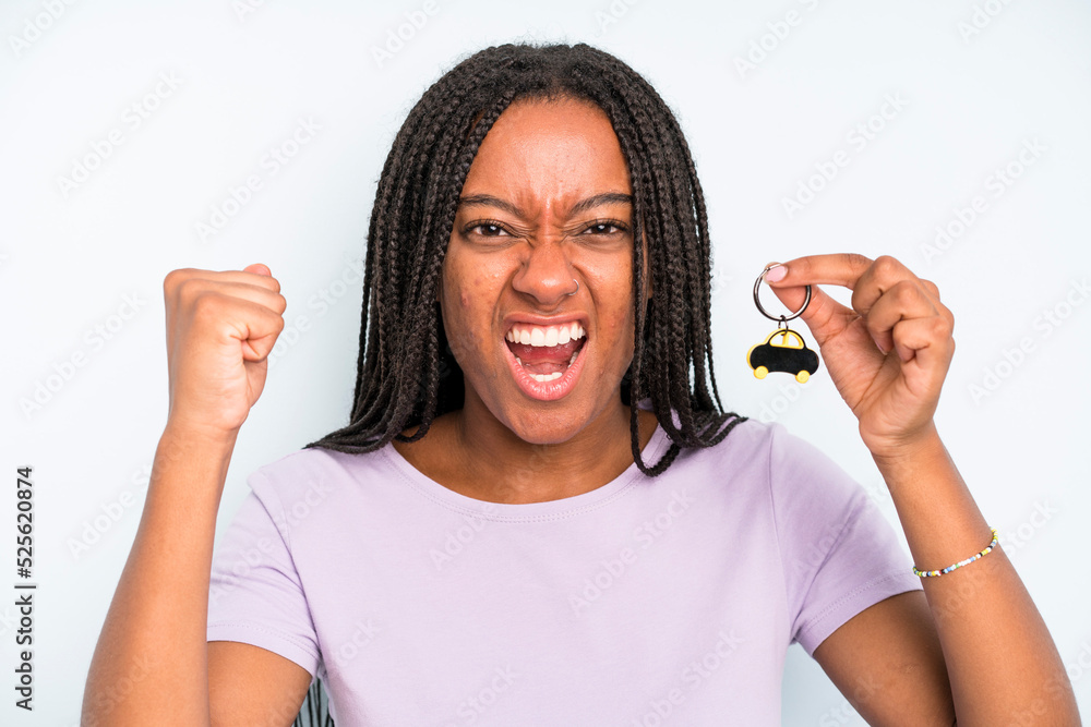 black pretty woman shouting aggressively with an angry expression. new ...