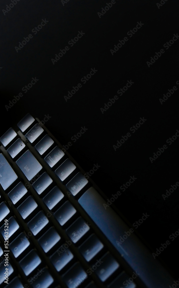 Black mechanical keyboard on a black desk vertical background Stock ...