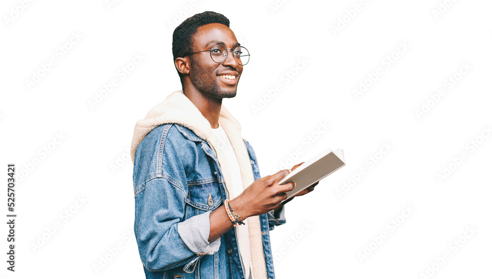 Portrait of smiling young african man student with book looking away ...