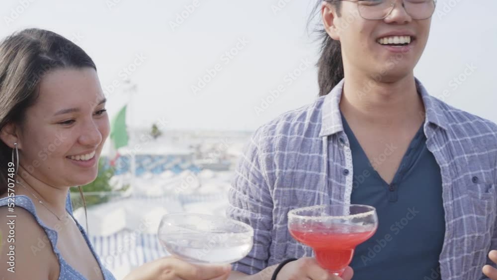 Slow motion of people dancing at daytime party at beach. Group of ...