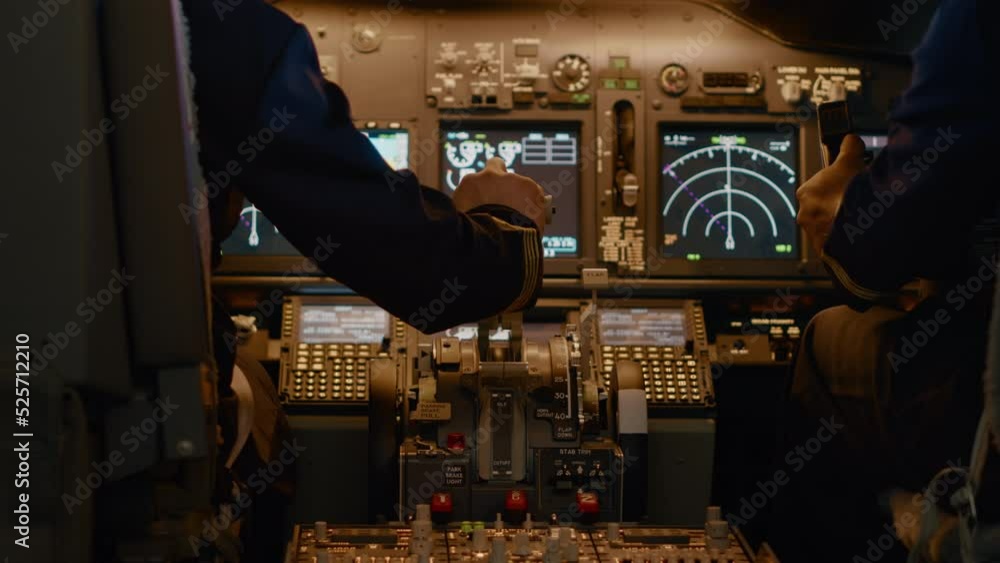 Airplane captain throttling engine to takeoff and fly plane, using ...