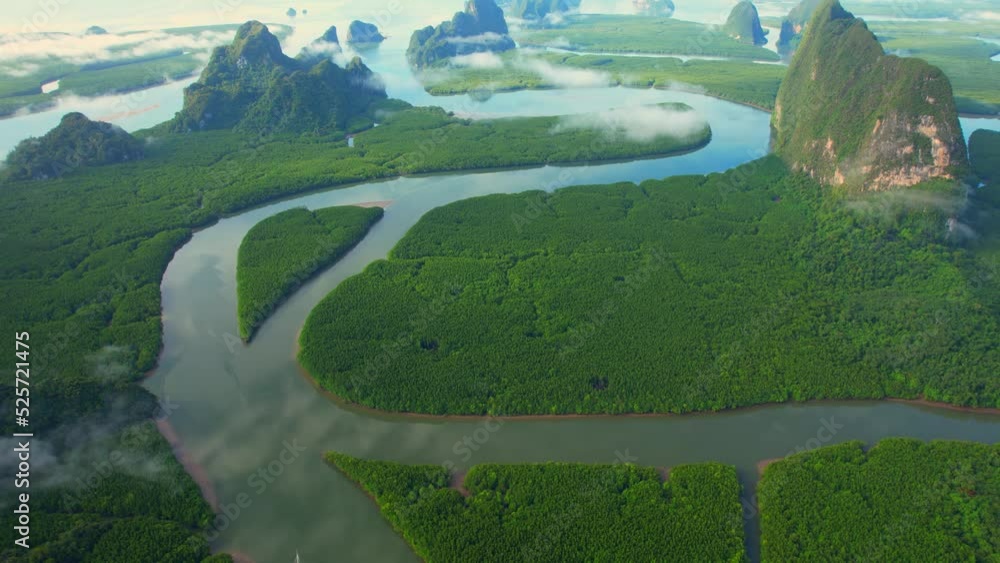Aerial view over the bends river and mangrove forests during sunrise ...