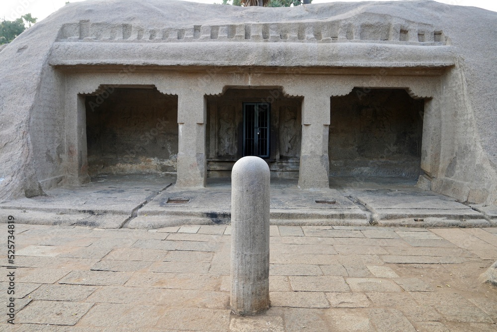 Rock cut cave temple with lingam carved in the rock. Monolithic ancient ...