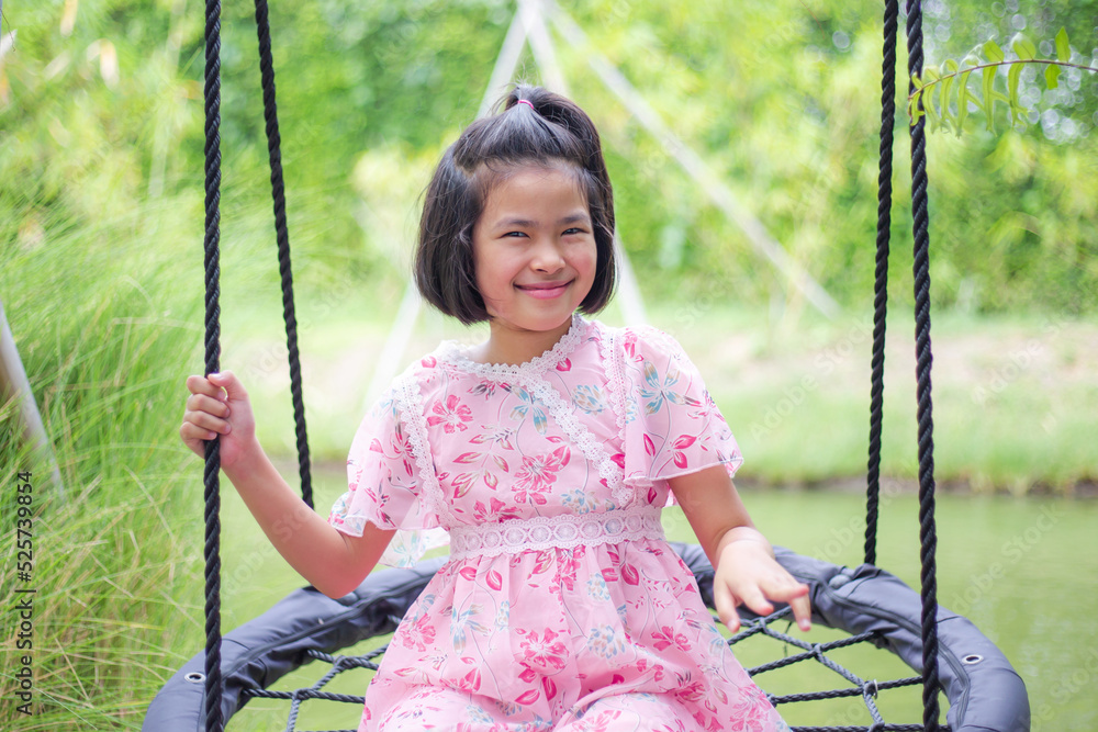 Outdoor close-up portrait of a pretty young teenage girl, Smiling child ...