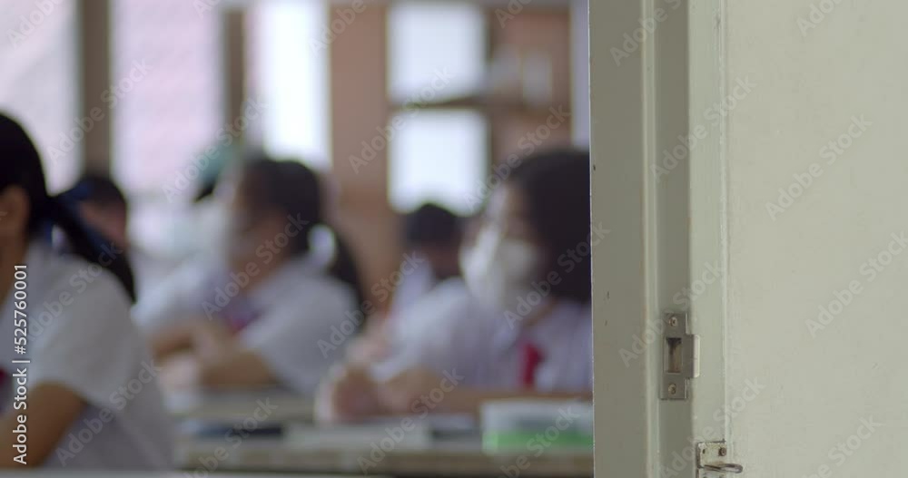 Blurred scene of Asian high school students sitting and studying in ...