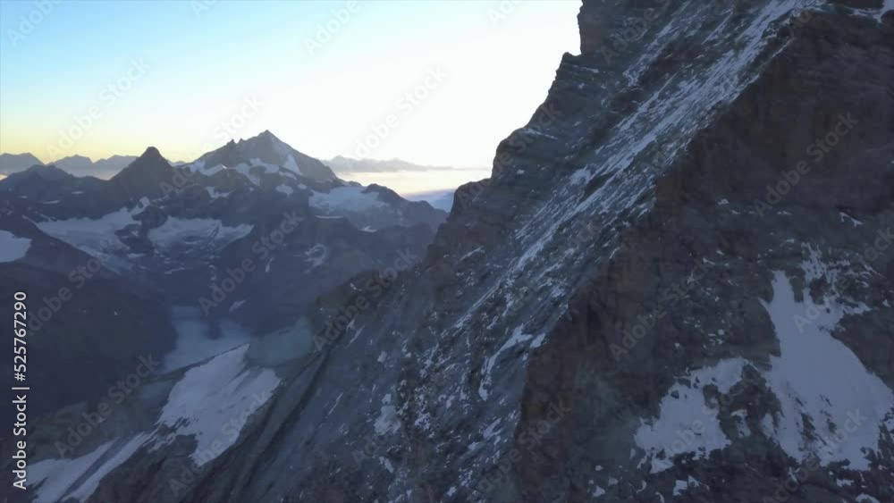 Drone descending along Lion Ridge approach from Italy to peak of The ...